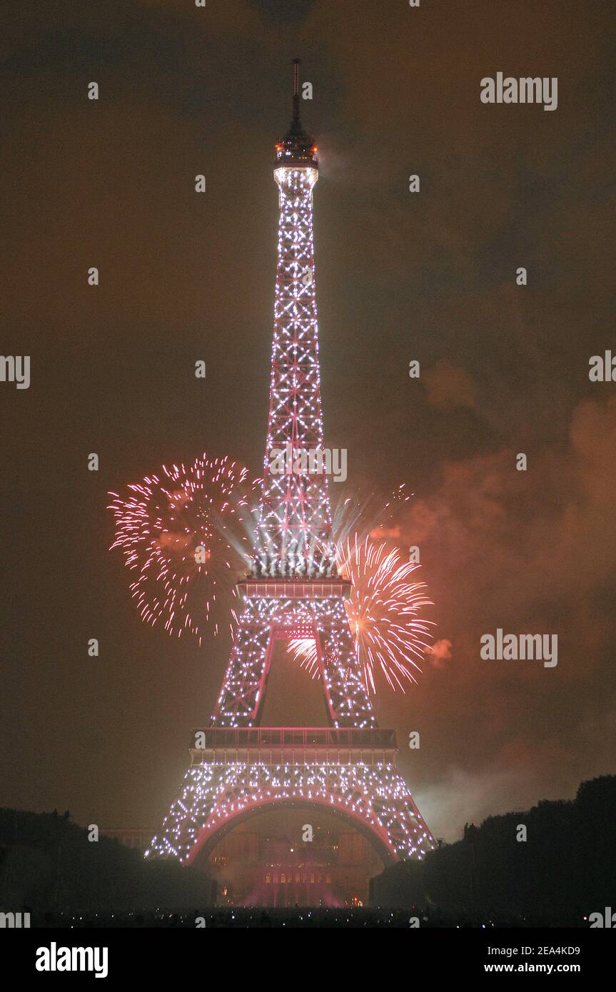 Fireworks illuminate the Eiffel Tower in Paris, France on July 14, 2005 ...