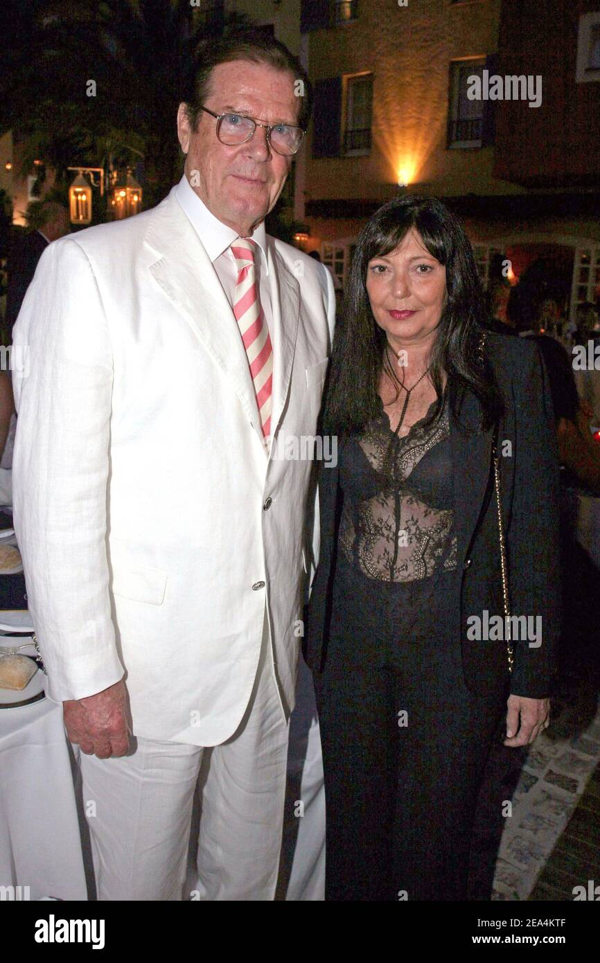 British actor Sir Roger Moore with Marie Berry (sister of French actor ...