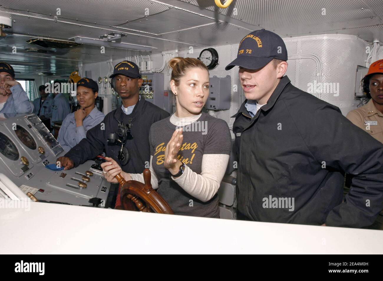 "Actress Jessica Biel receives instructions on how to steer the ship ...