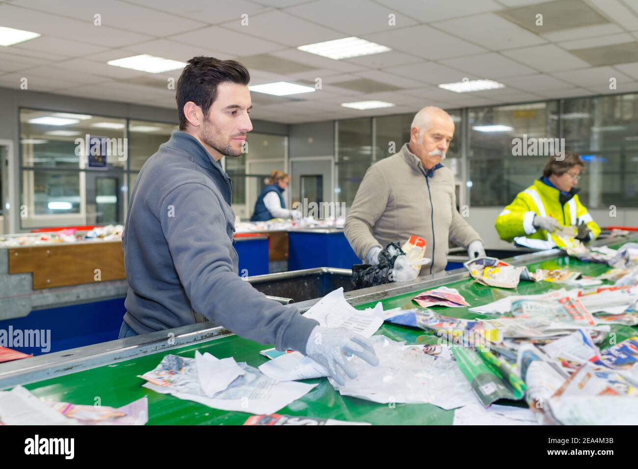 recycling factory workers segregating rubbish Stock Photo - Alamy
