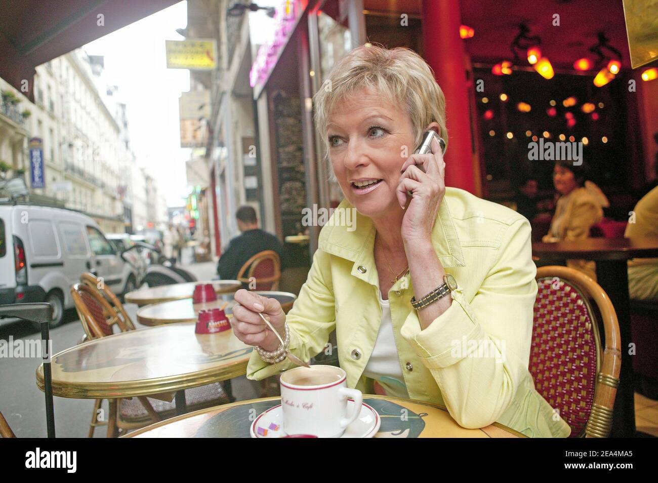 Evelyne Leclercq poses in her apartment in Paris, France, on July 1 ...