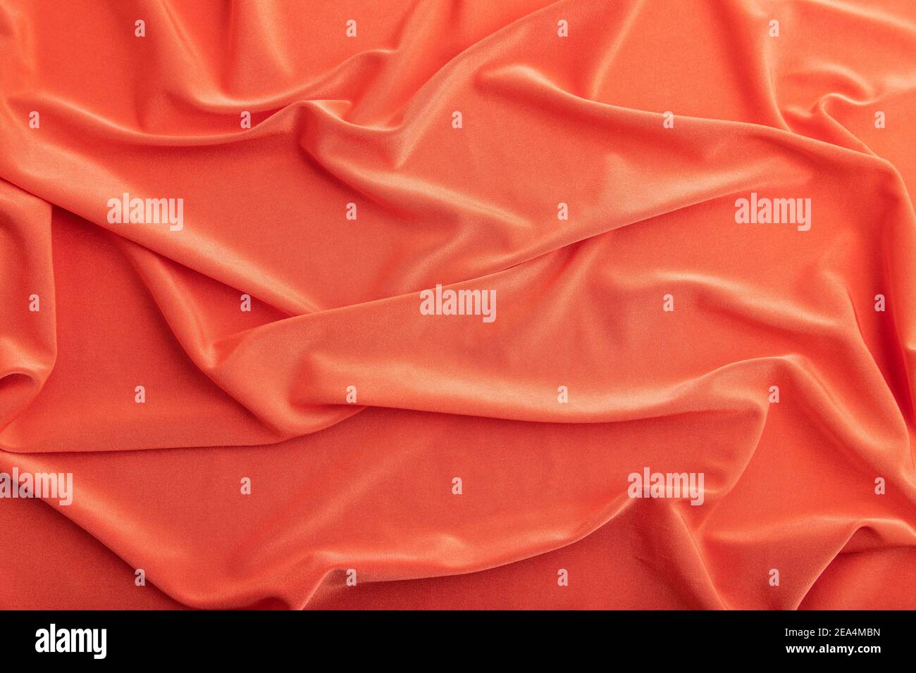 Fragment of red silk tissue. Top view, natural textile background and ...