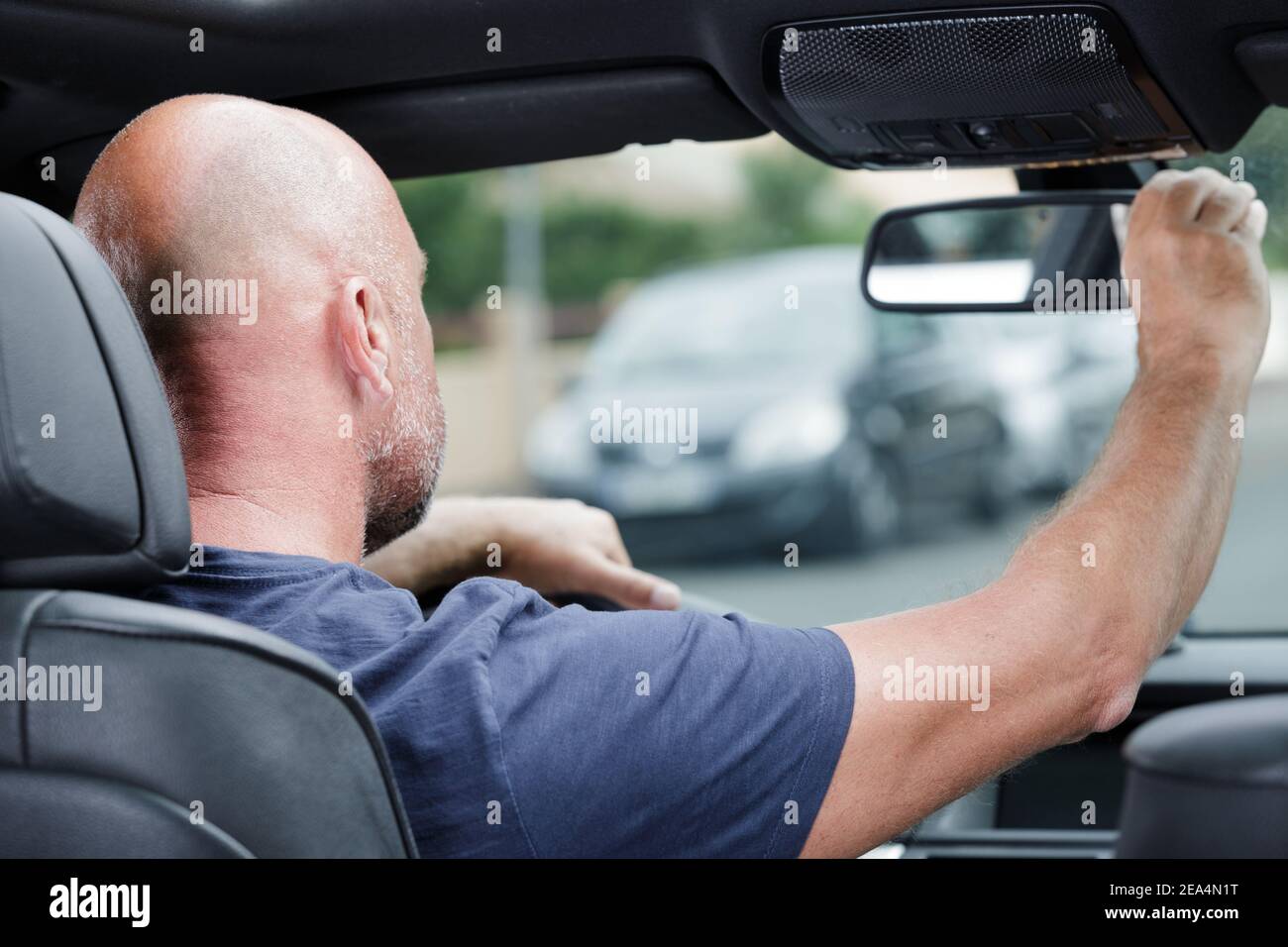 Checking rear view mirror hi-res stock photography and images - Alamy