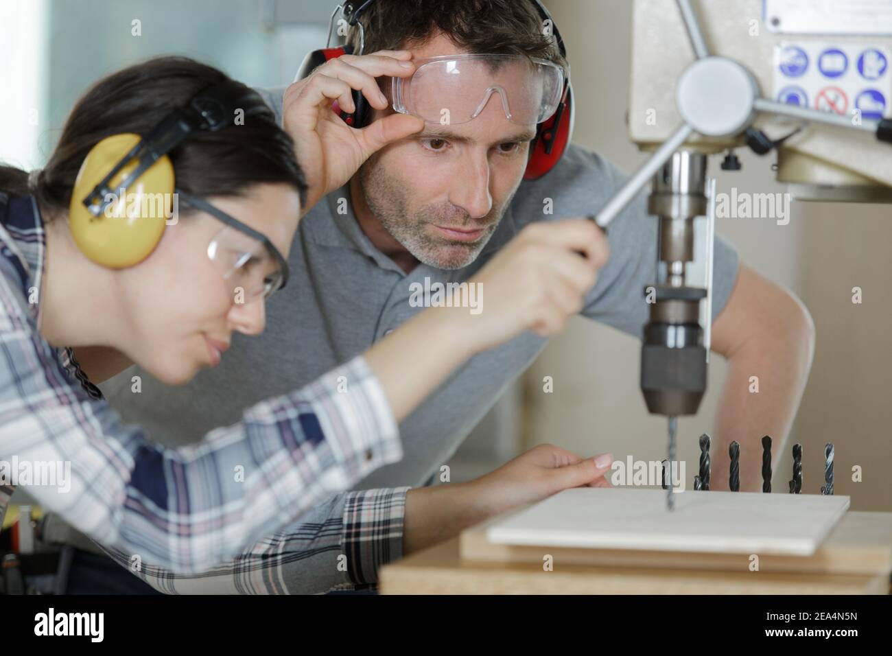 Female handyman drill hi-res stock photography and images - Alamy