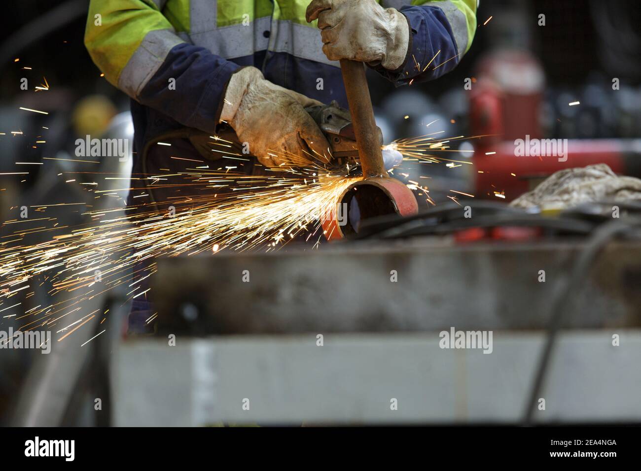 angel grinder make a flash sparks metal cutting Stock Photo - Alamy