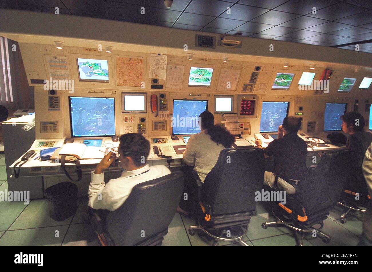 Air-traffic controllers at work in the command room of the control ...