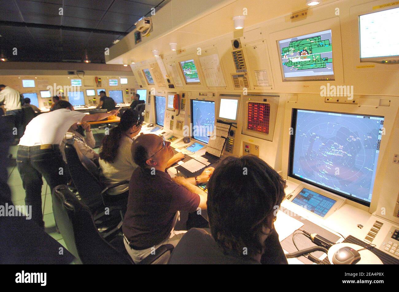 Air-traffic controllers at work in the command room of the control ...