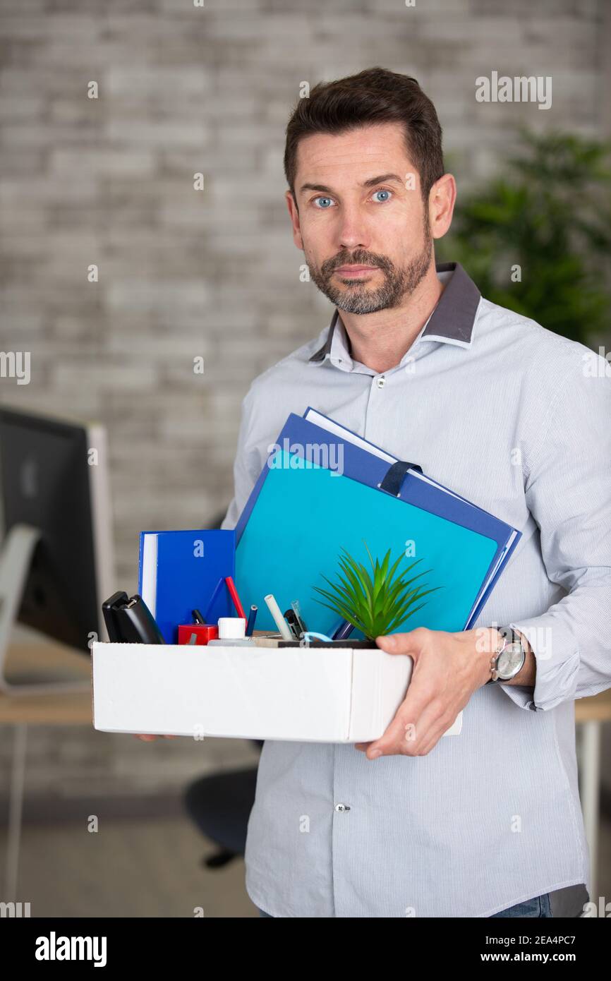 Handsome man taking box hi-res stock photography and images - Alamy