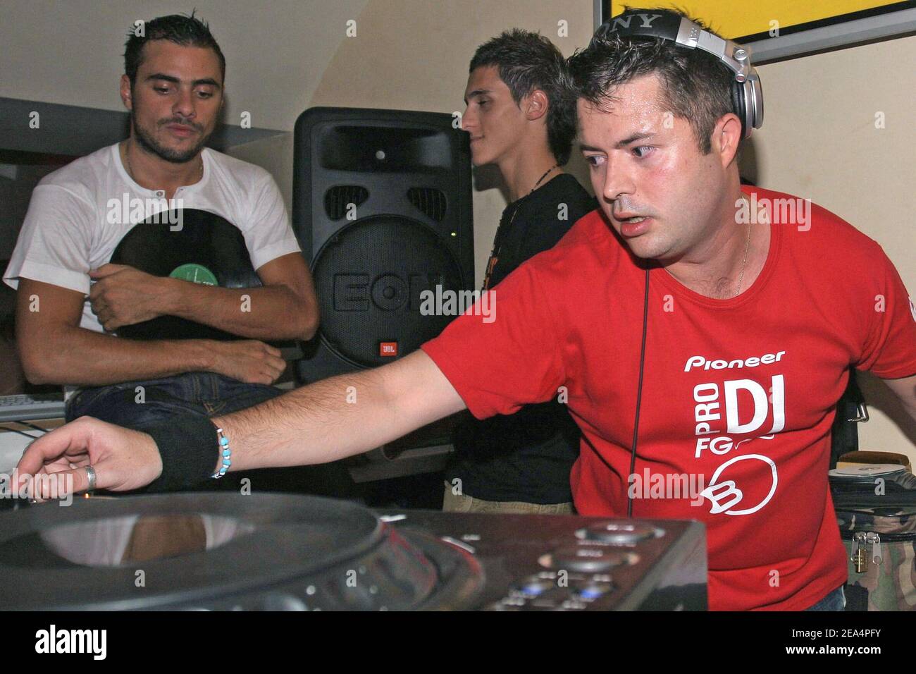 French DJ Greg Di Mano of Radio FG mixing at 'Papagayo' club in Saint ...