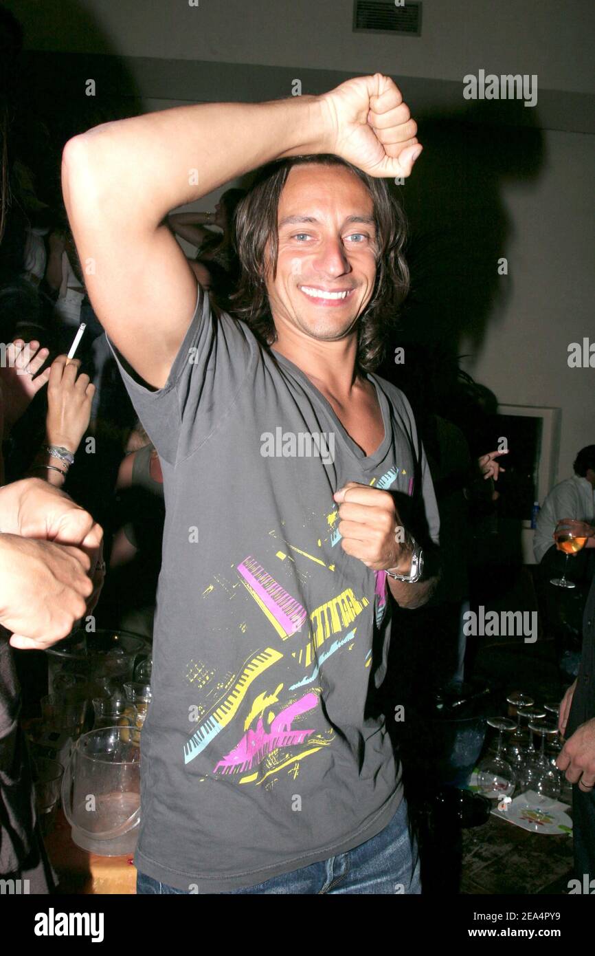 French star DJ Bob Sinclar dancing at 'Papagayo' club in Saint-Tropez ...