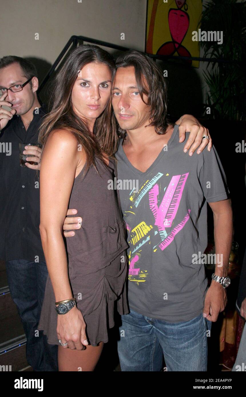 French star DJ Bob Sinclar poses with his wife before mixing at ...