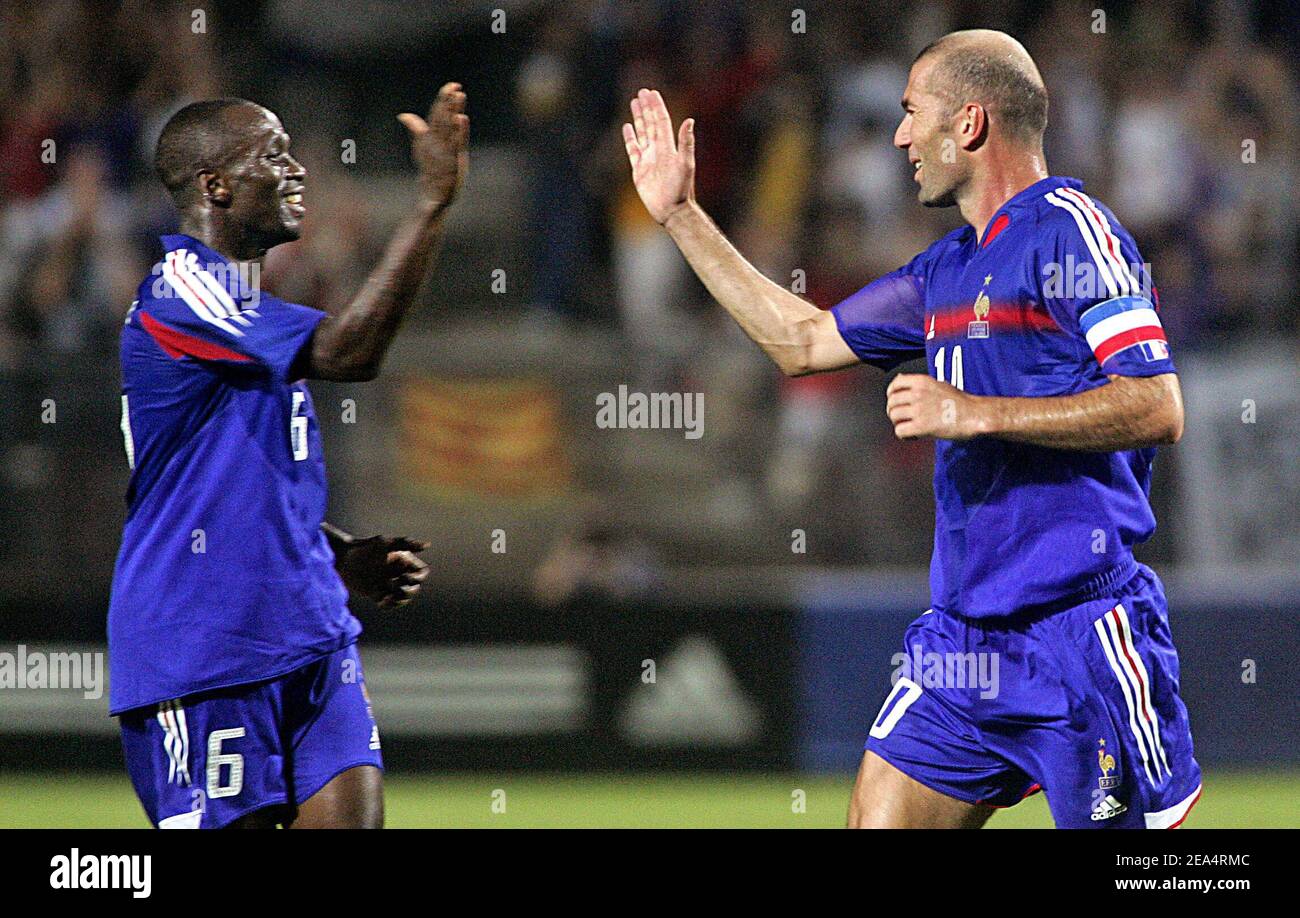French midfielder Zinedine Zidane (R), who returns to play for France a ...