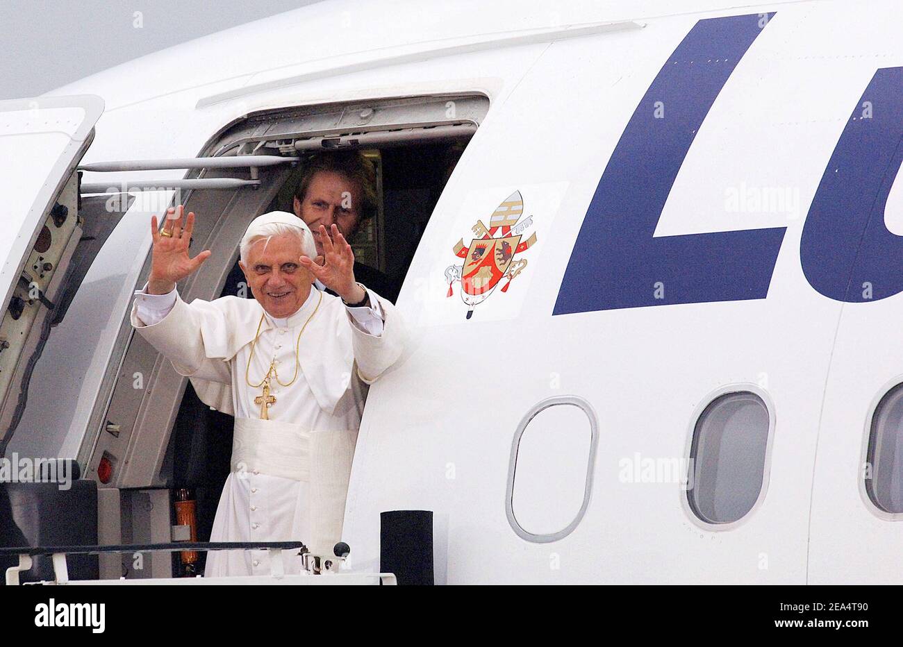 Pope Benedict XVI greets the crowd as he departs from Cologne National ...