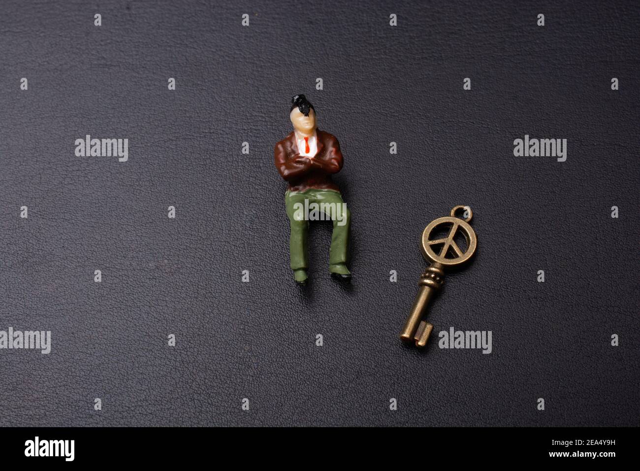 Tiny figurine of man and woman miniature model in view Stock Photo - Alamy