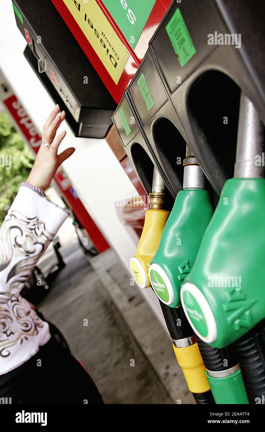 A car driver fills up at a gas station in Bordeaux, southwestern France ...