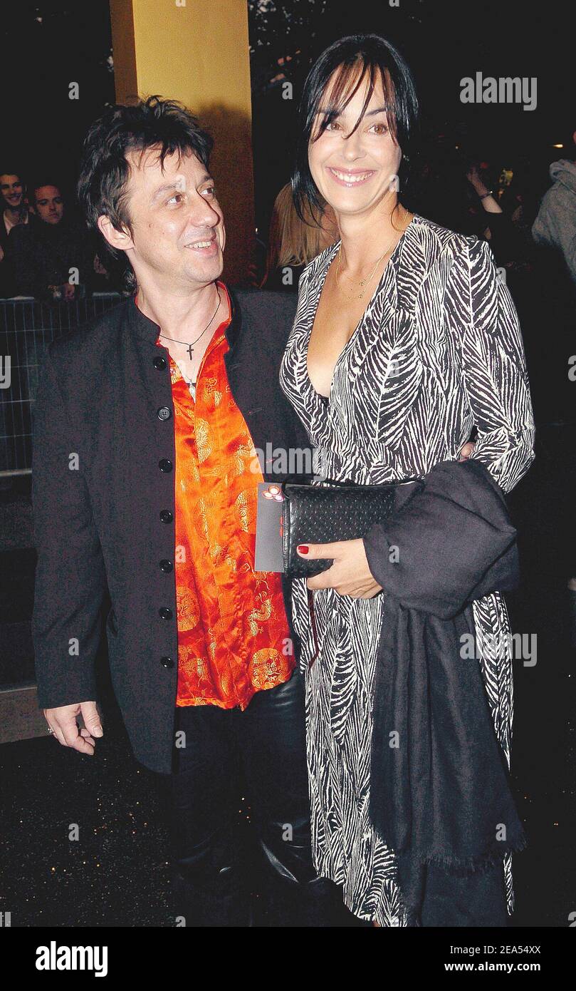 French composer Eric Serra and his wife attend the French premiere of ...