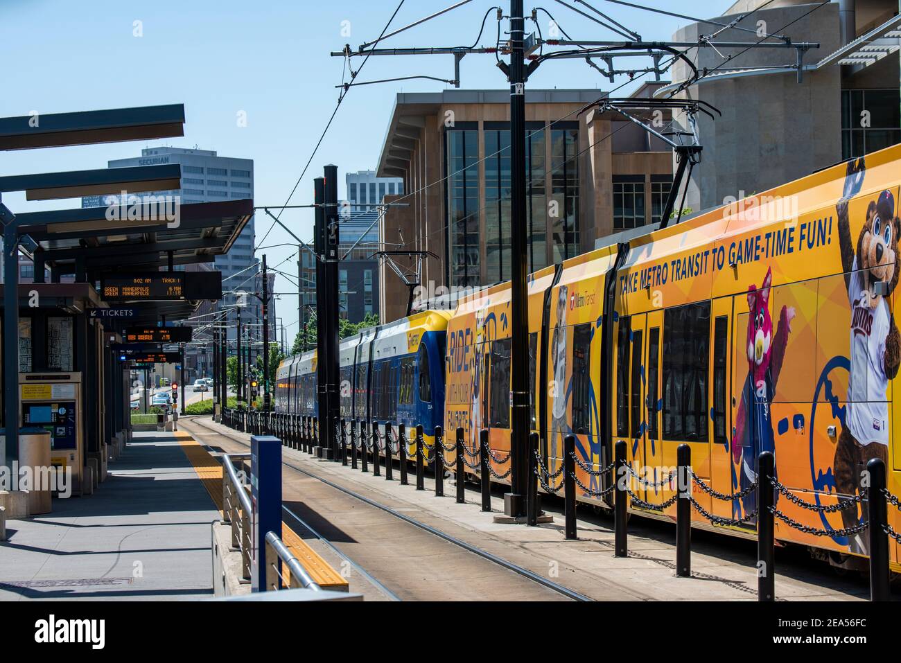 St. Paul, Minnesota. Light rain train going through a station and ...