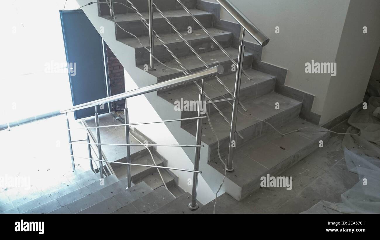 Renovation work in a residential building, handrails are installed on ...