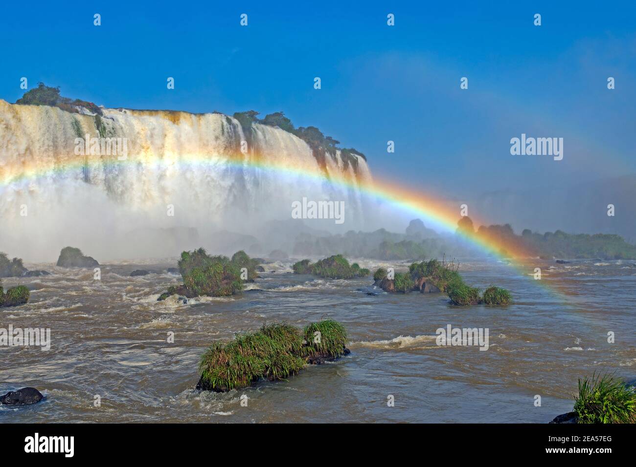 Rainbow Spanning the Rapids Beneath the Falls at Iguazu Falls in Brazil ...