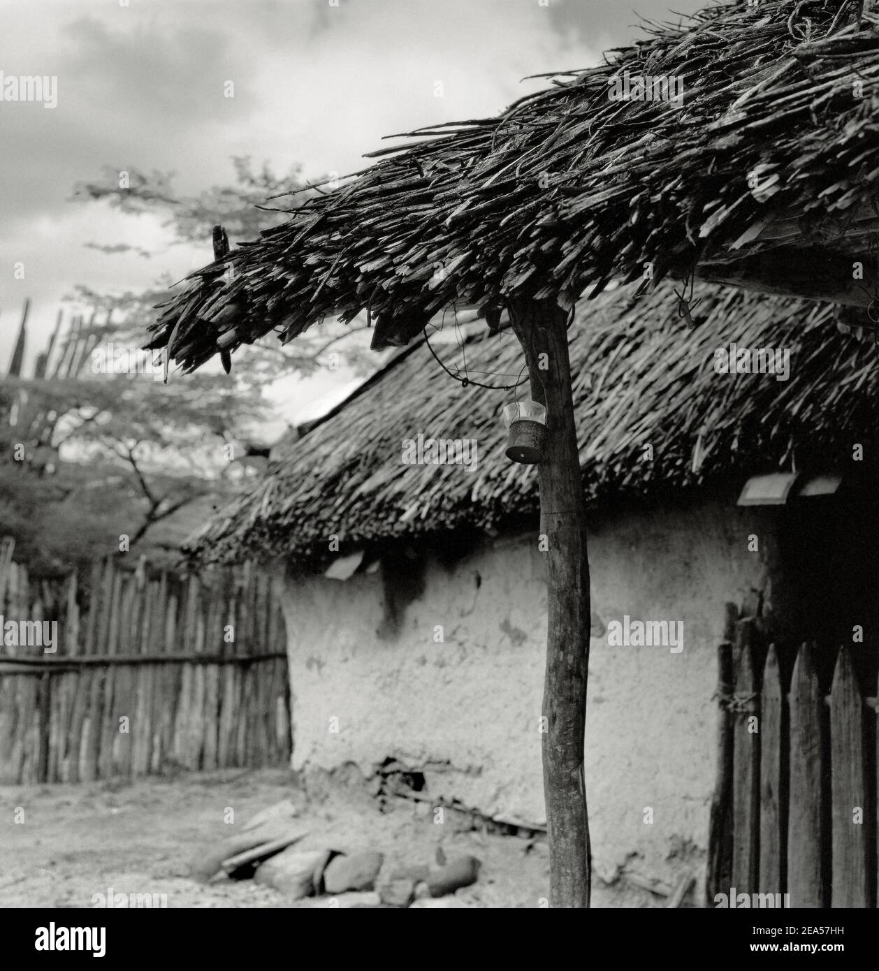 Hande made house from adobe clay dirt and roof from thatch in Lara ...