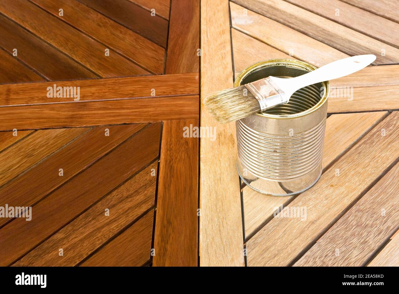Staining wooden table. Before and after Stock Photo - Alamy