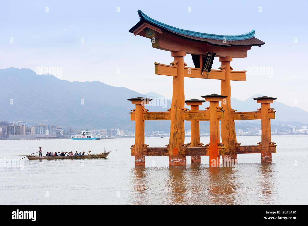 Tori gate on Miyajima island, Japan Stock Photo - Alamy