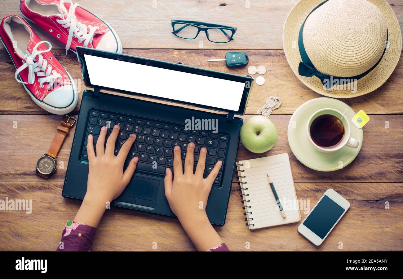 Planning a trip laptop map hi-res stock photography and images - Alamy