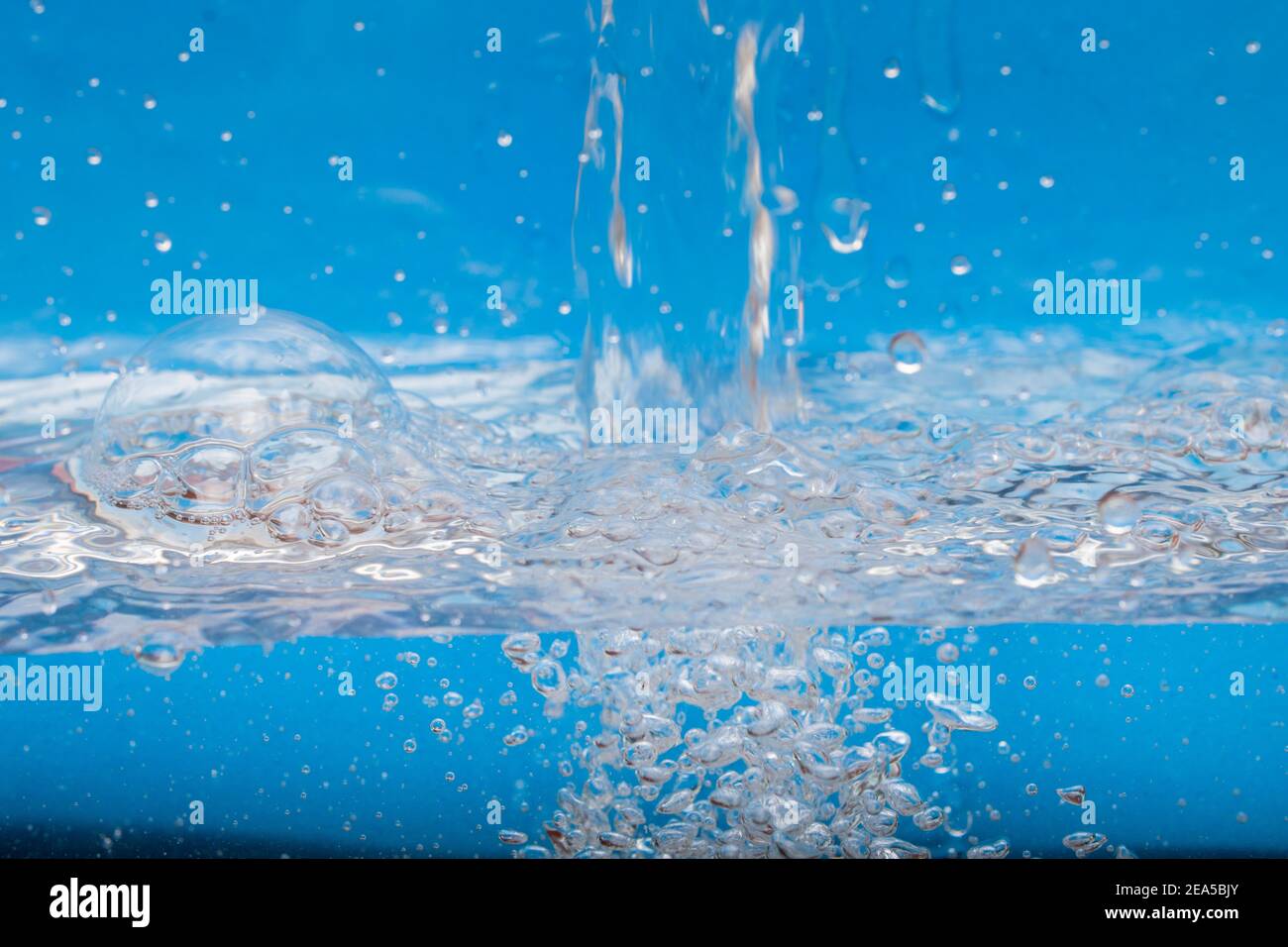 Water flowing cause many bubbles in water under the water Stock Photo ...