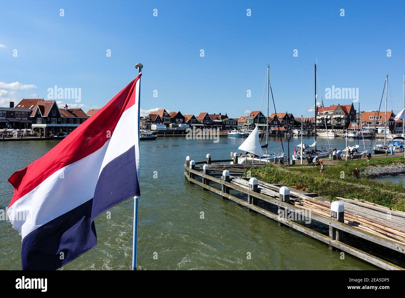 A Dutch flag on the stern of a ferry, flying in the wind when sailing ...