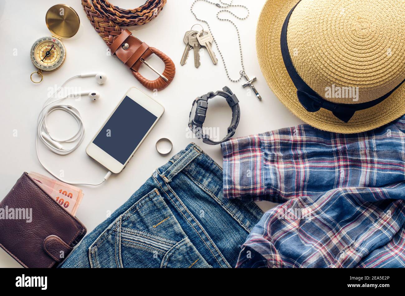 Travel accessories on white background ready for travel Stock Photo - Alamy