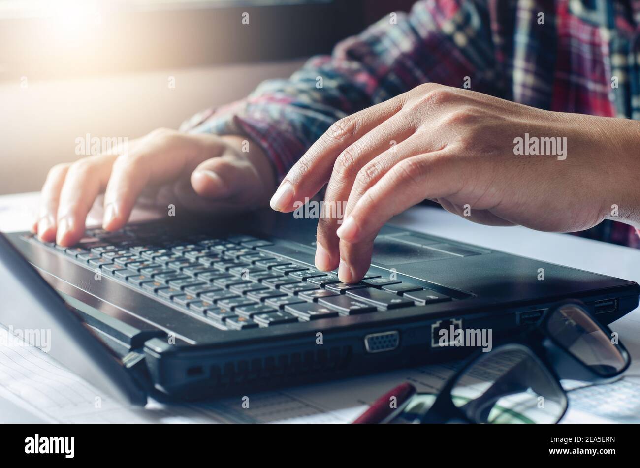 Closeup hand are using laptops Stock Photo - Alamy