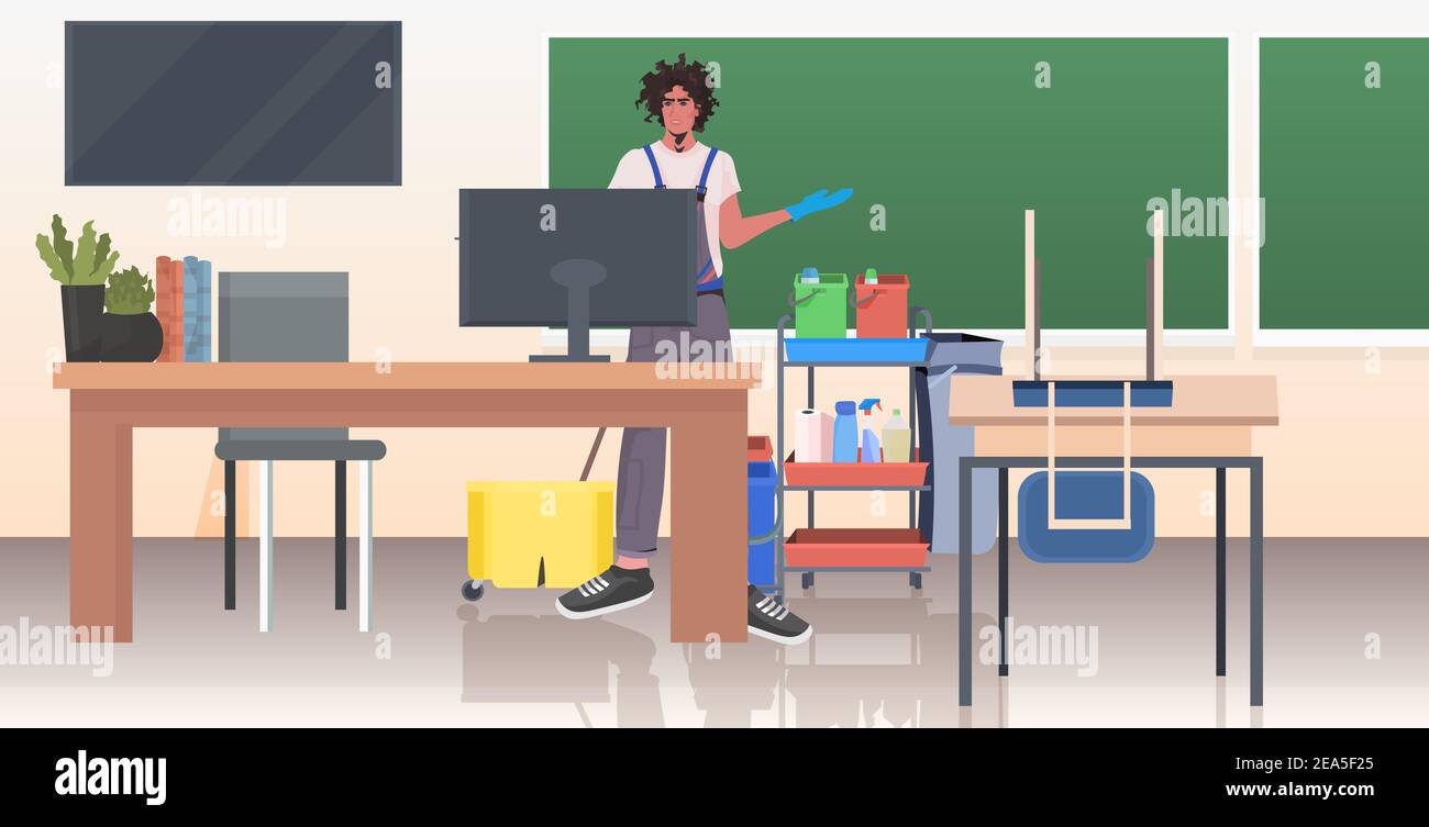 professional cleaner male janitor cleaning and disinfecting floor to ...