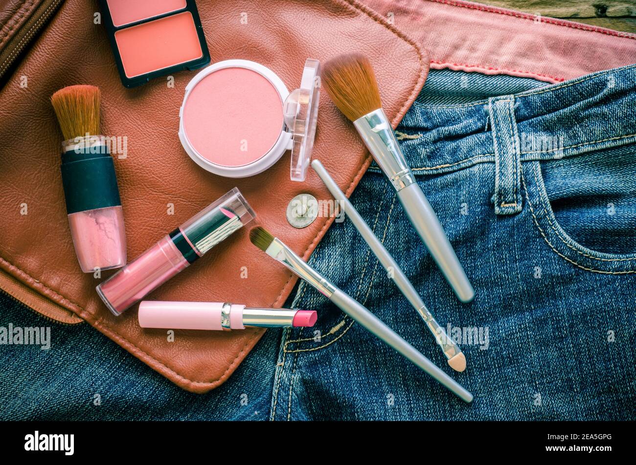 Cosmetics and clothes ready for the journey of a young woman Stock ...