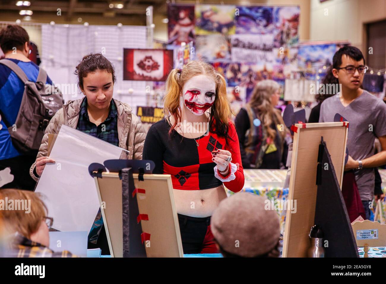 Teenage girl dressed as DC Comics character Harley Quinn attends the ...