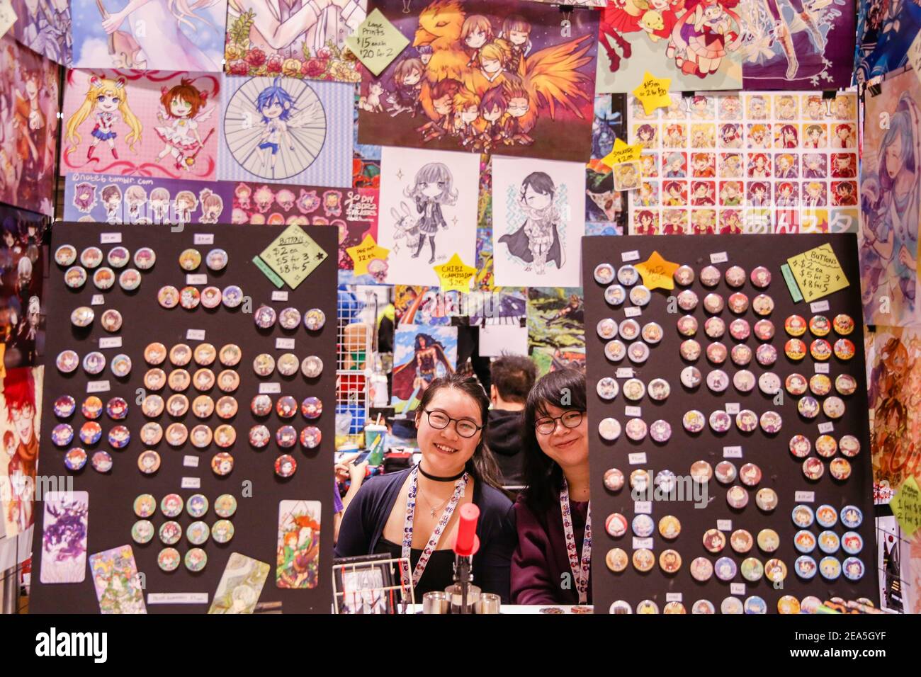 Vendors are seen selling various items at their booth during the event ...