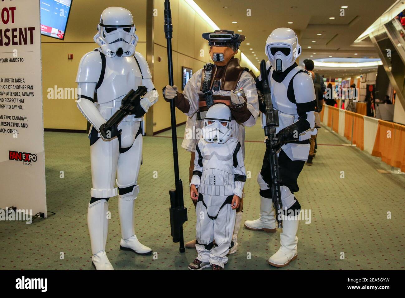Group of friends, three of them dressed as Stormtroopers and one as ...