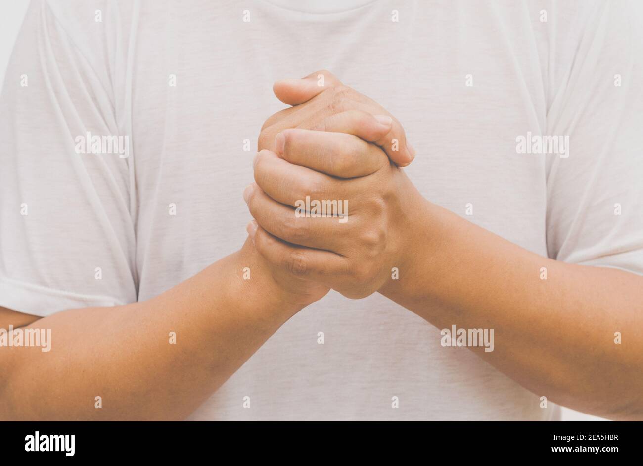 Body language of man - Pray for God's blessing Cross Stock Photo - Alamy