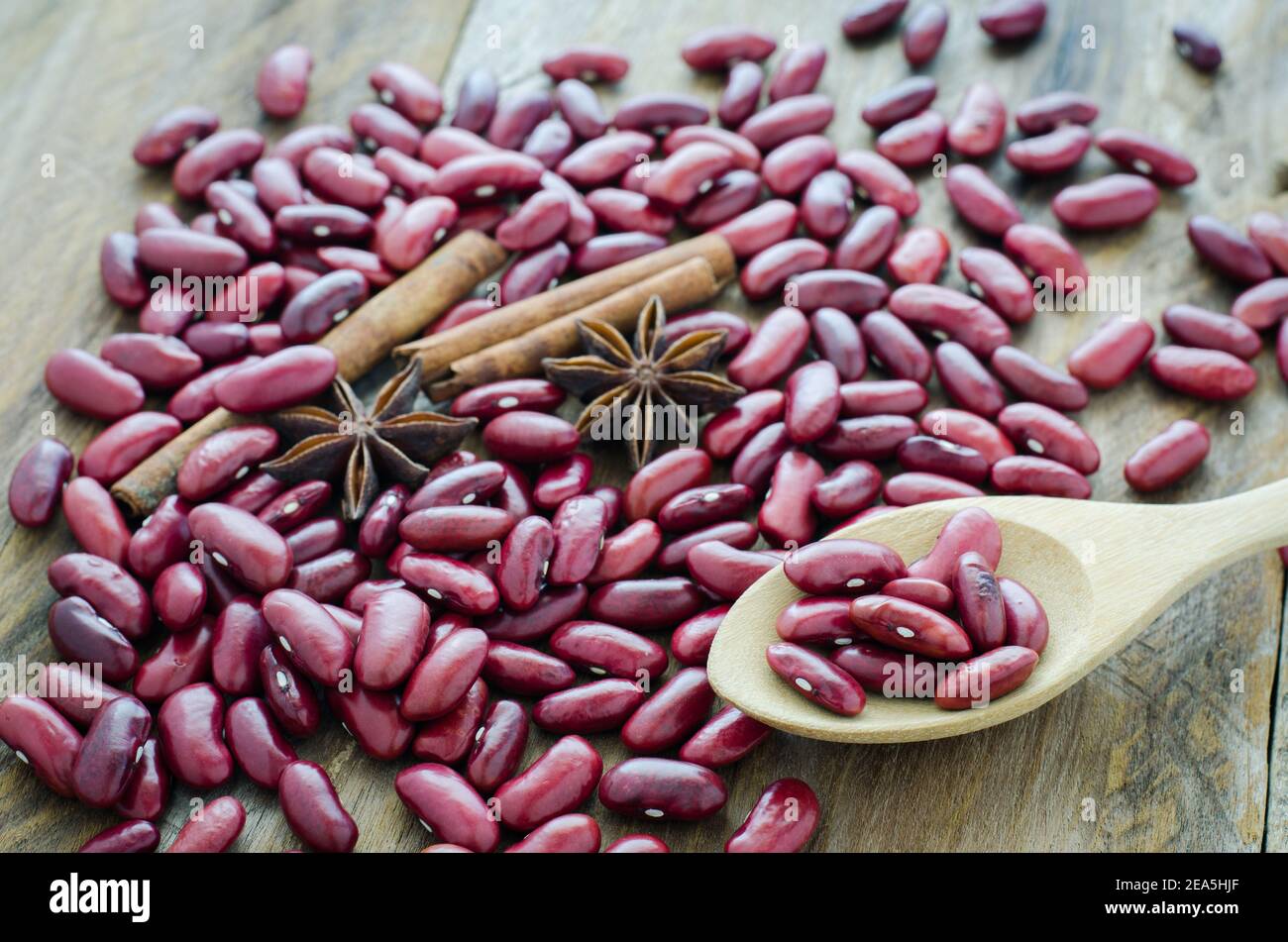 Red beans on the wooden floor Stock Photo - Alamy