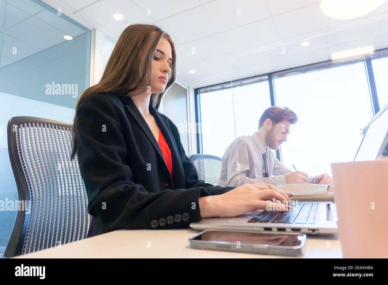 Office employee having a meeting with their team Stock Photo - Alamy