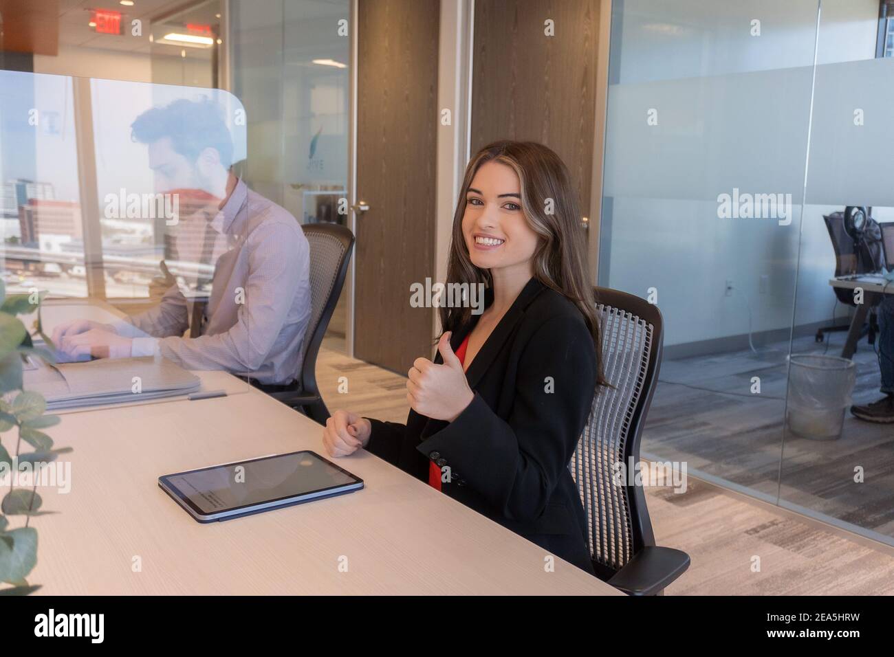 Office employee having a meeting with their team Stock Photo - Alamy