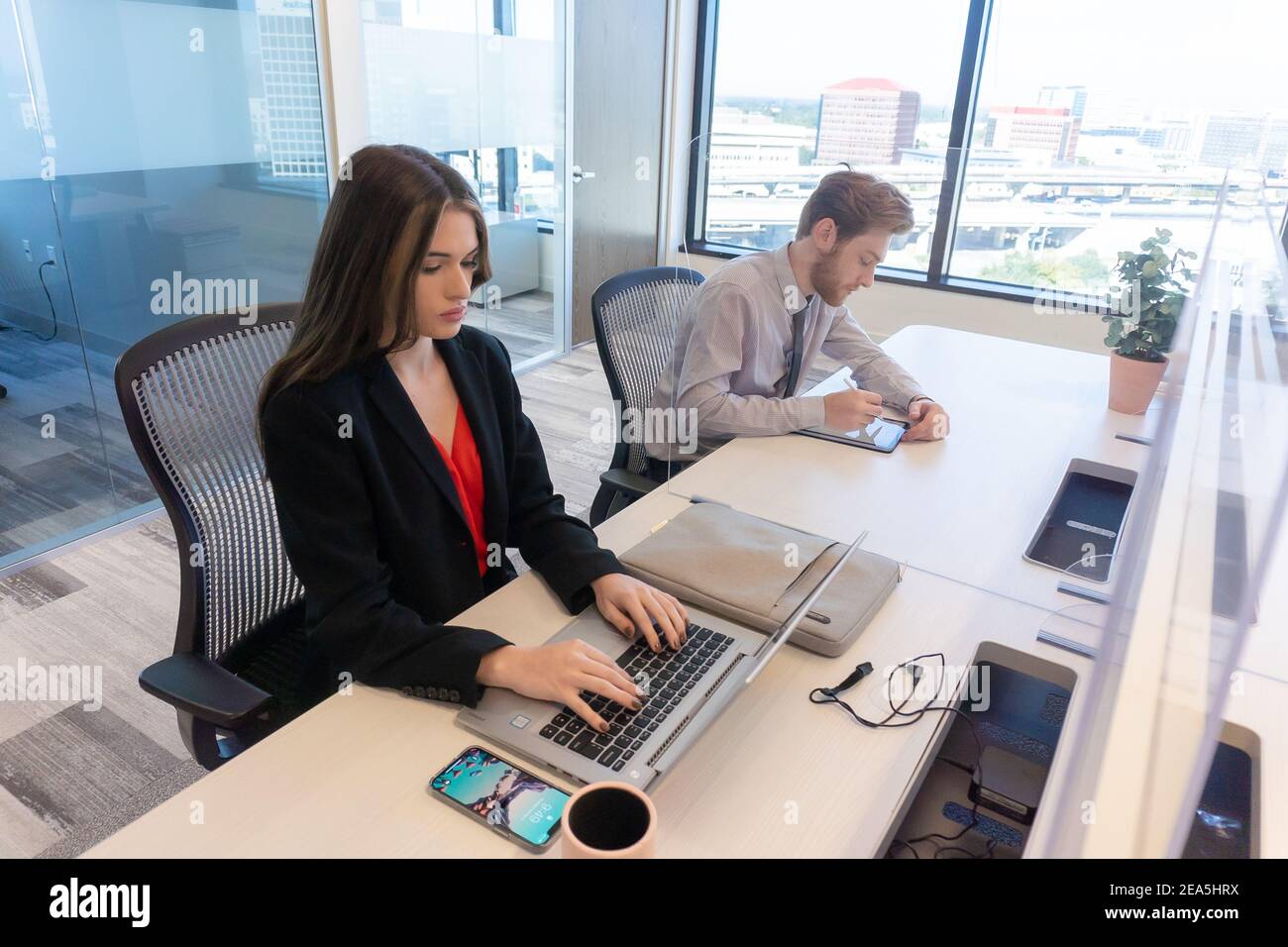 Office employee having a meeting with their team Stock Photo - Alamy