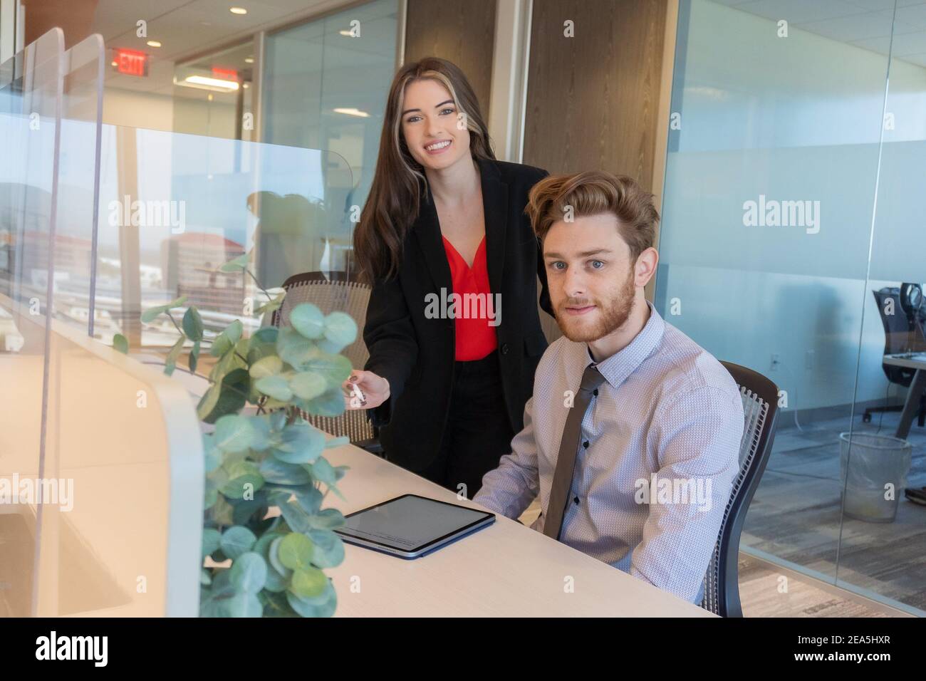 Office employee having a meeting with their team Stock Photo - Alamy