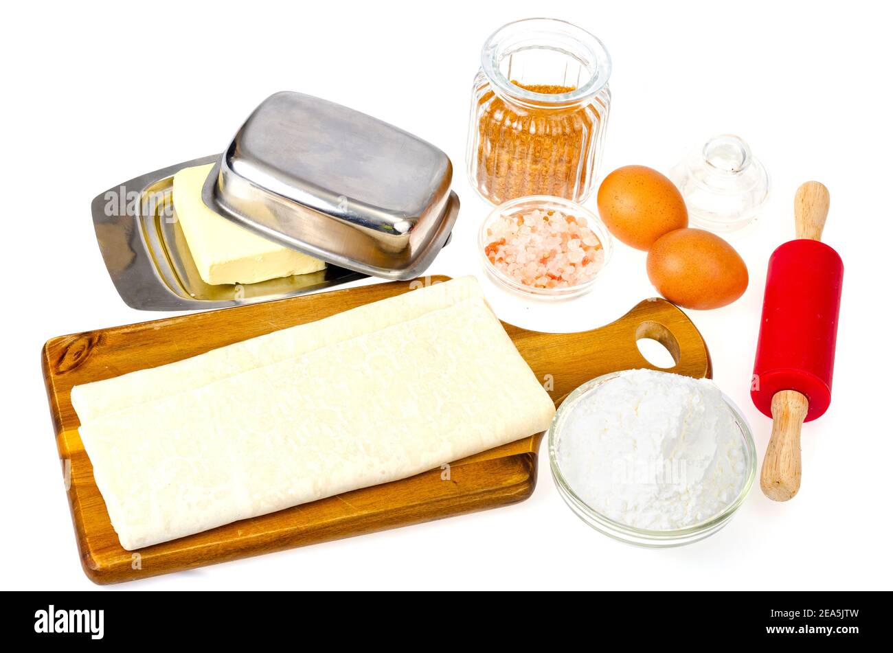 Plate of raw homemade baking dough on white background Stock Photo - Alamy