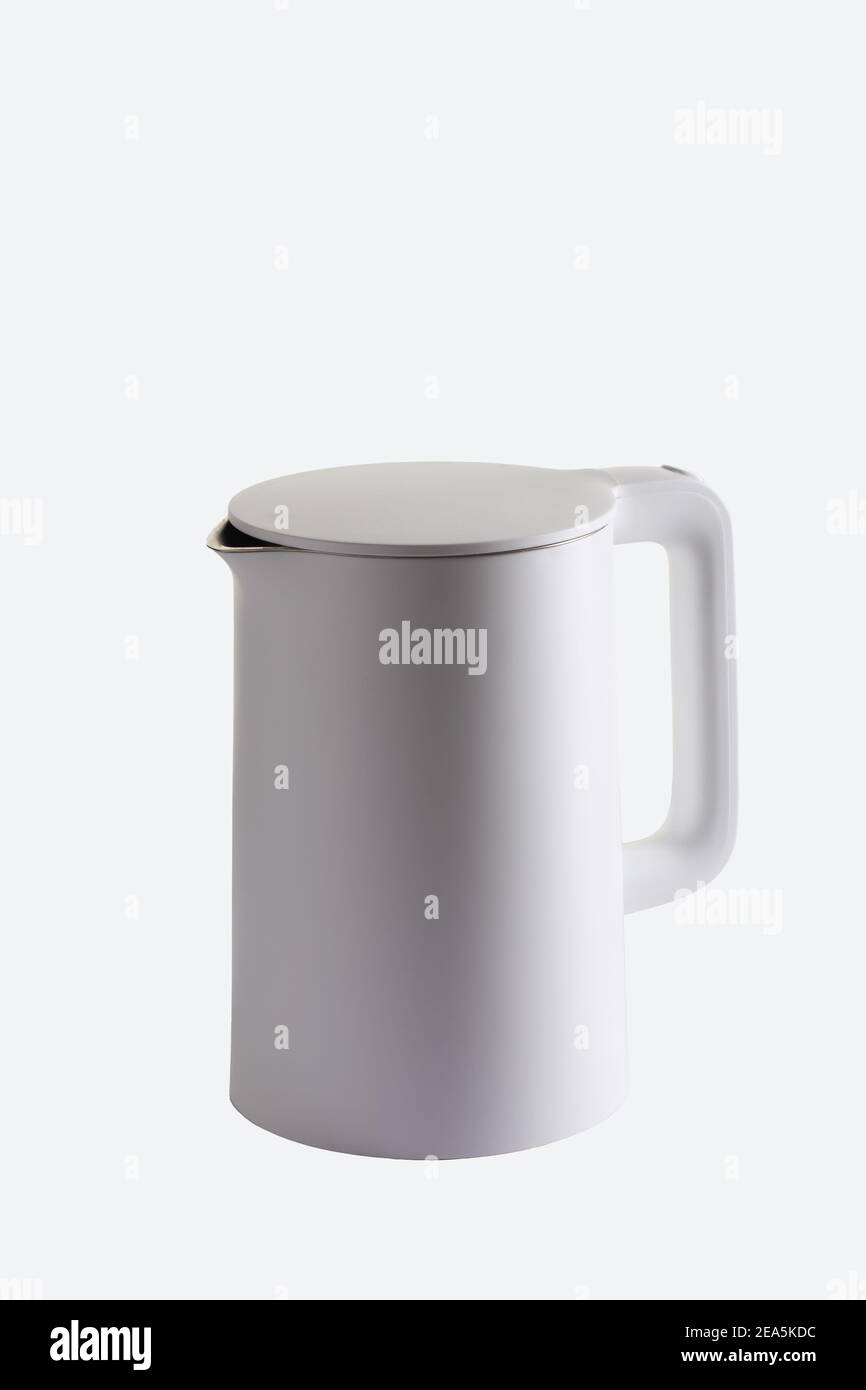 white plastic electric kettle isolated on white background. side view ...