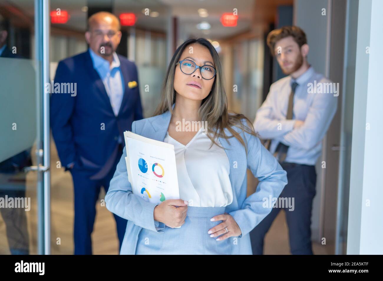 Office employee having a meeting with their team Stock Photo - Alamy