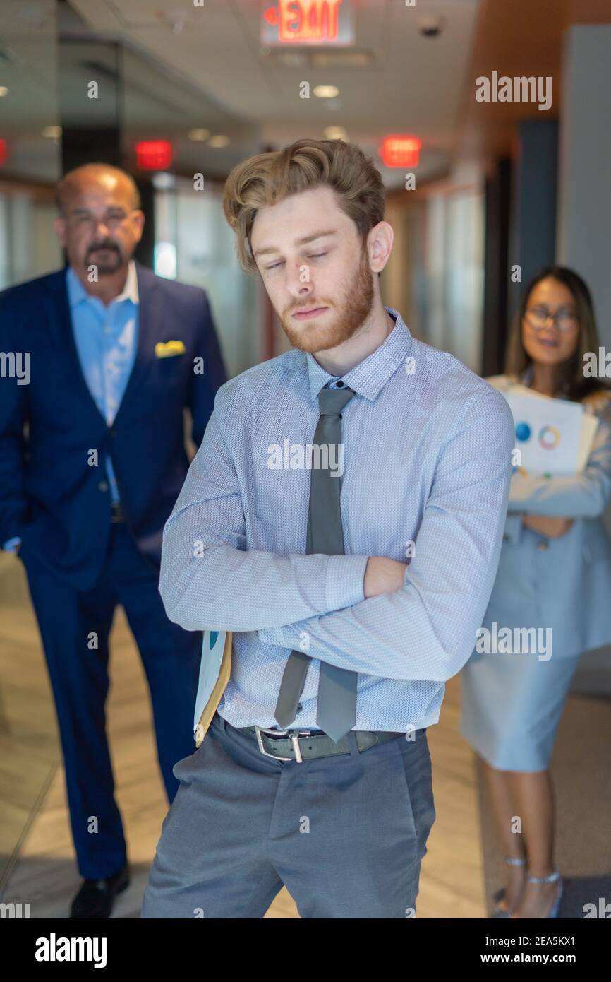 Office employee having a meeting with their team Stock Photo - Alamy