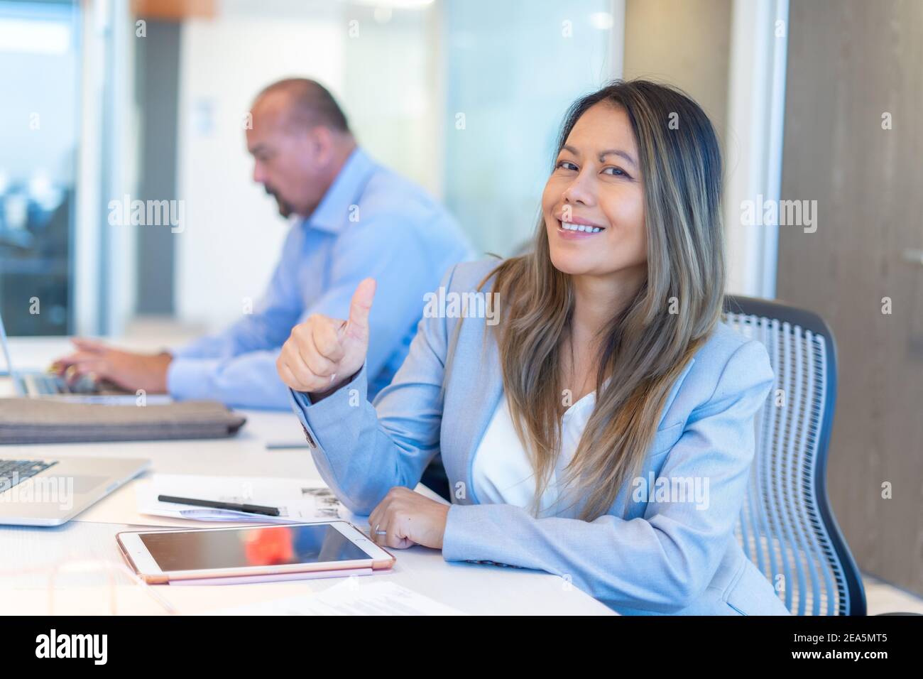 Office employee having a meeting with their team Stock Photo - Alamy