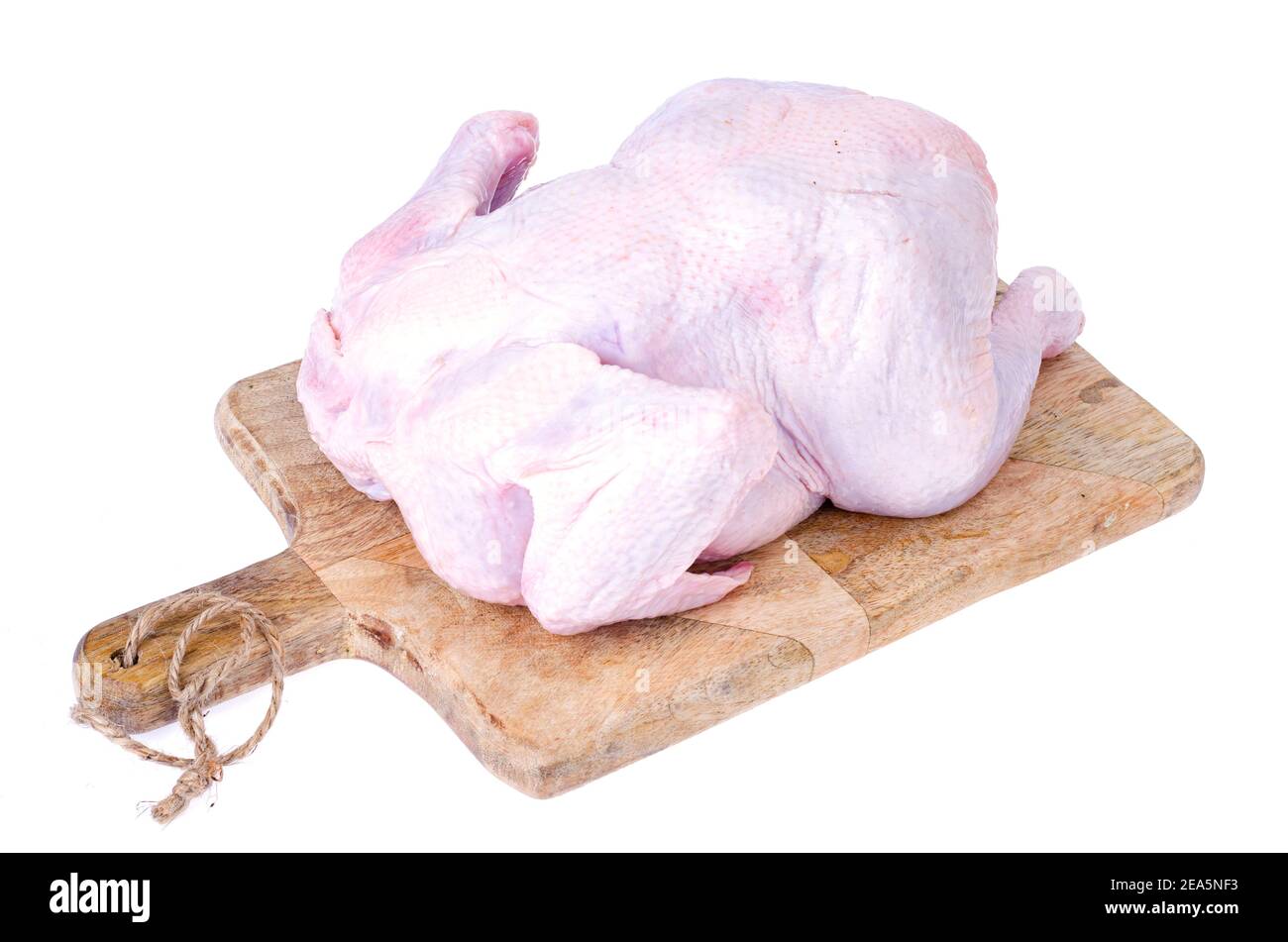 Raw chicken carcass on kitchen cutting board Stock Photo - Alamy