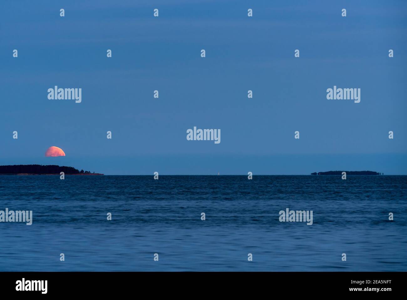 Rising moon seen from Mustasaari island, Pyhtää, Finland Stock Photo ...