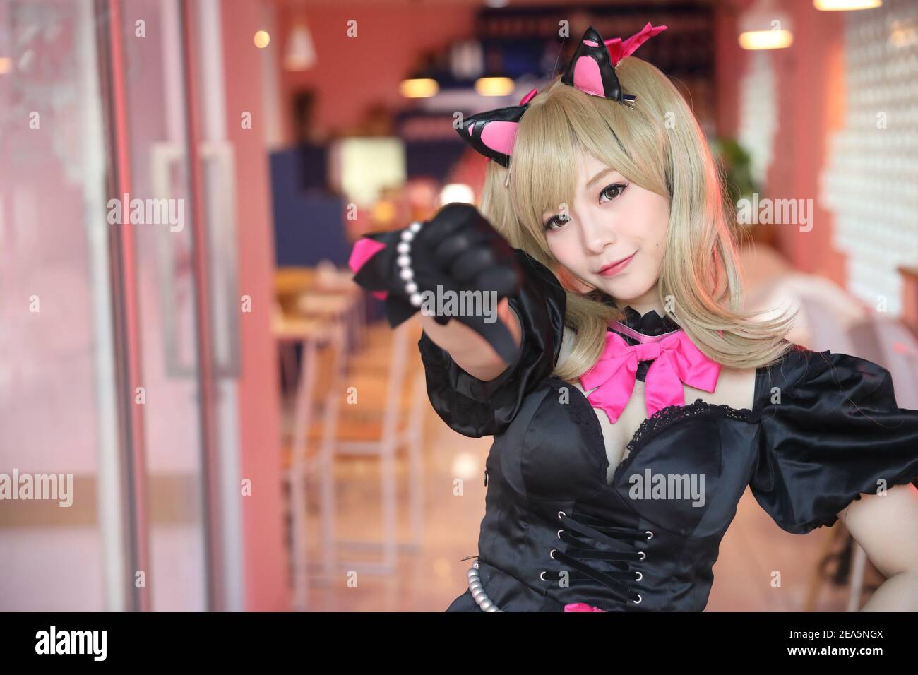Japan anime cosplay , portrait of girl cosplay in pink room background ...